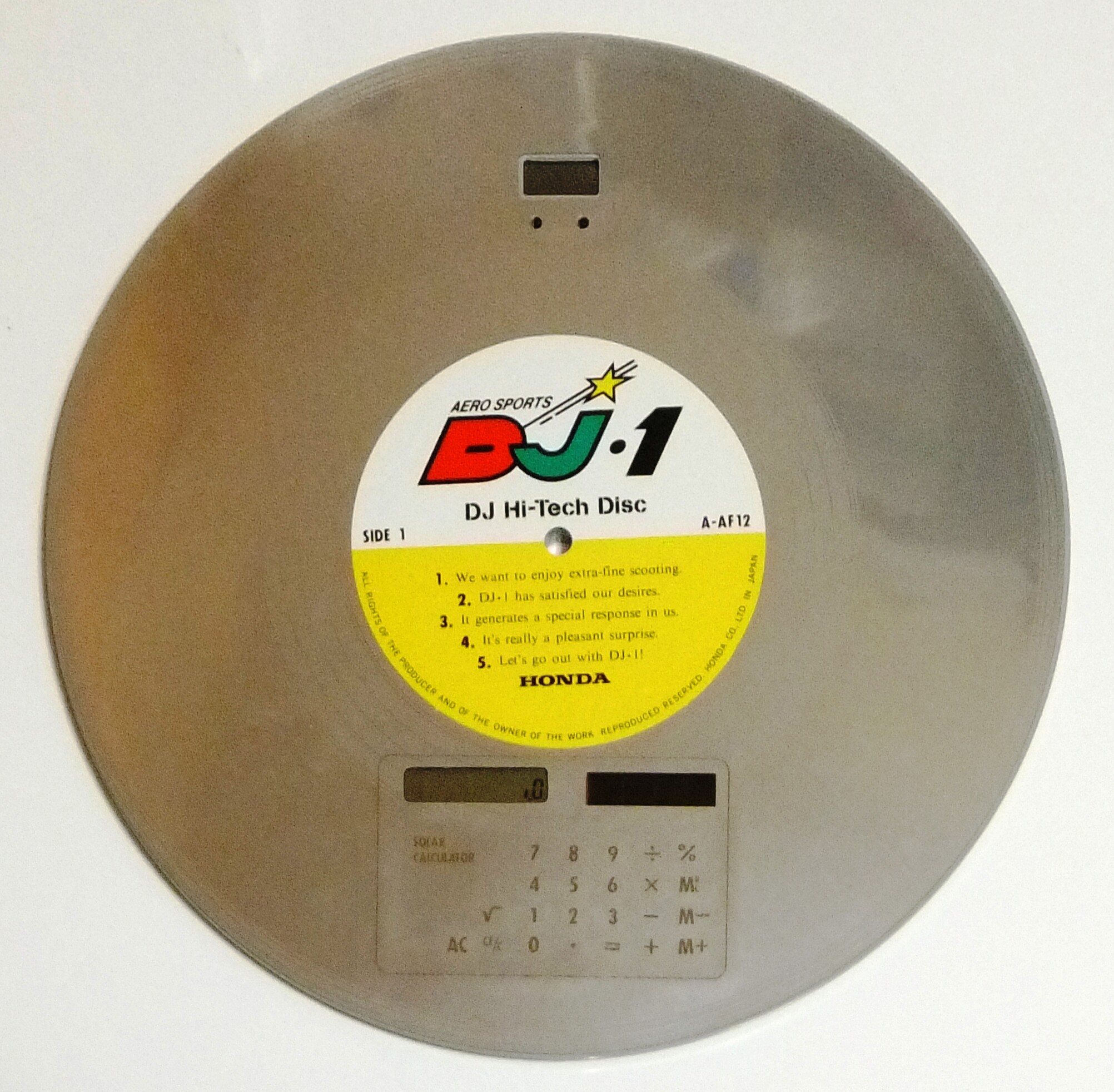 ゴミか宝か？ : HONDAオリジナル電卓ディスク DJ Hi-Tech Disc [擬似レコード・電卓＆時計/A-AF12]