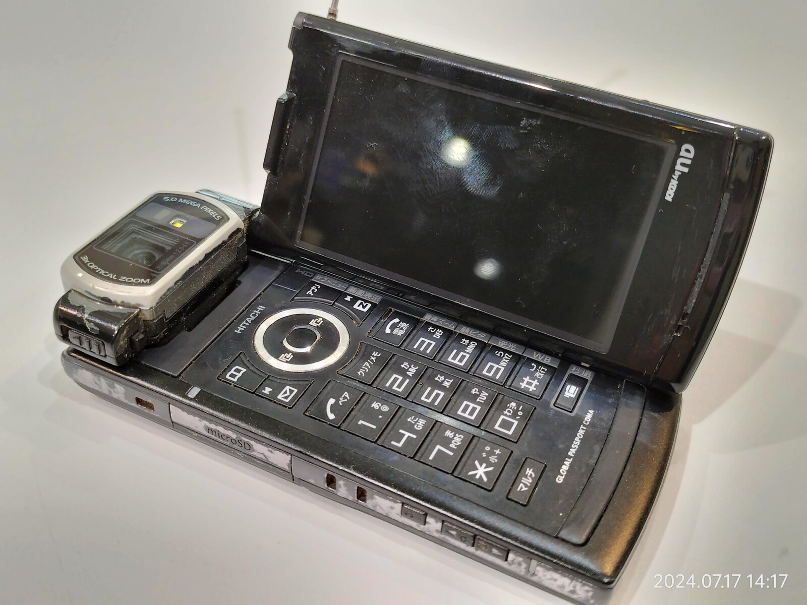 2009/平成21/au/HITACHI/Mobile Hi-Vision CAM Wooo/500万画素/3倍光学ズーム/ビデオカメラ ...